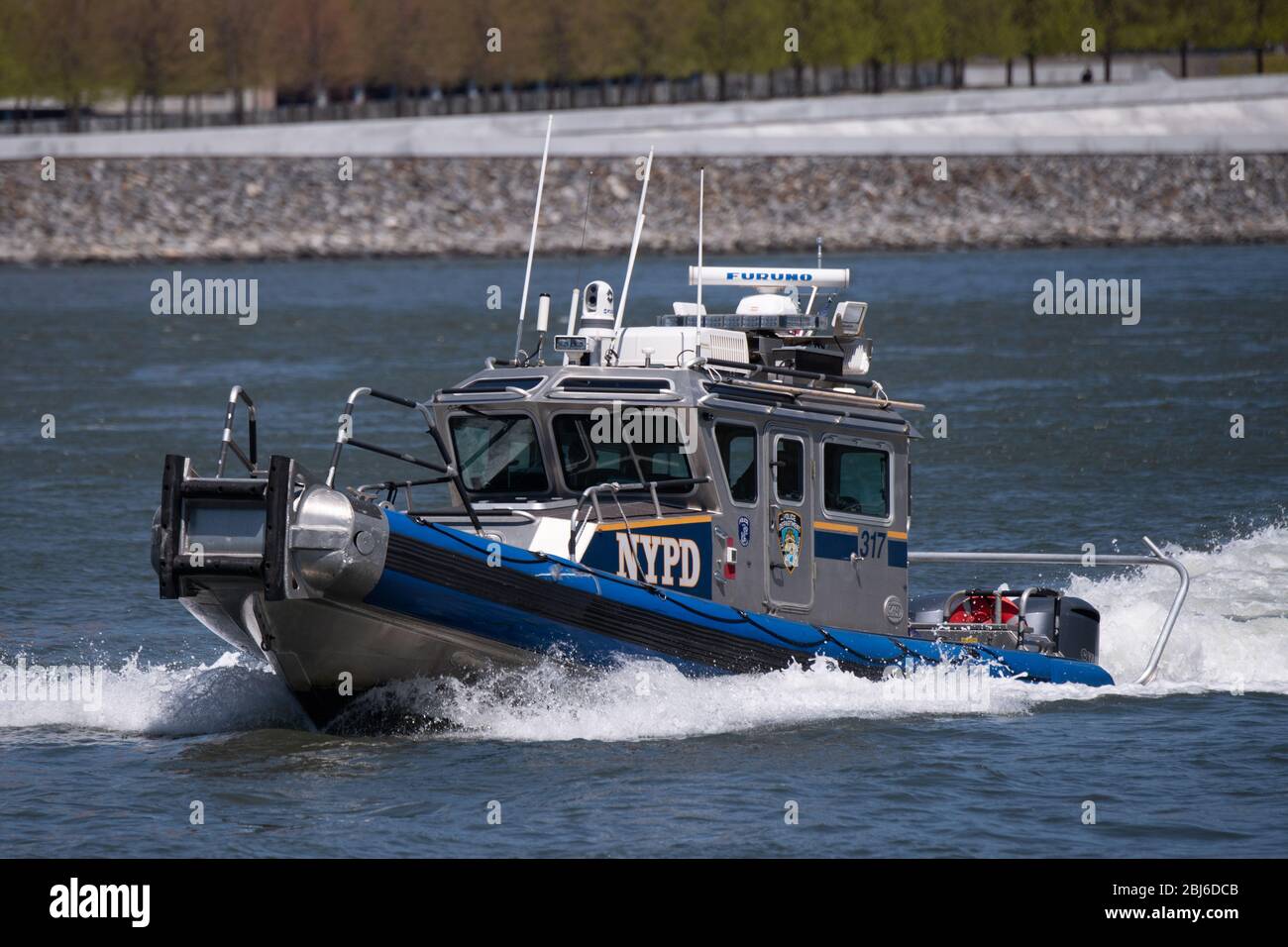 NEW YORK, NY - APRIL 28, 2020: NYPD Police boat patrols the East River ...