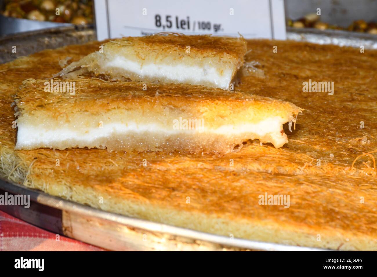 Delicious traditional Turkish dessert: Kunefe kadayif with pistachio ...