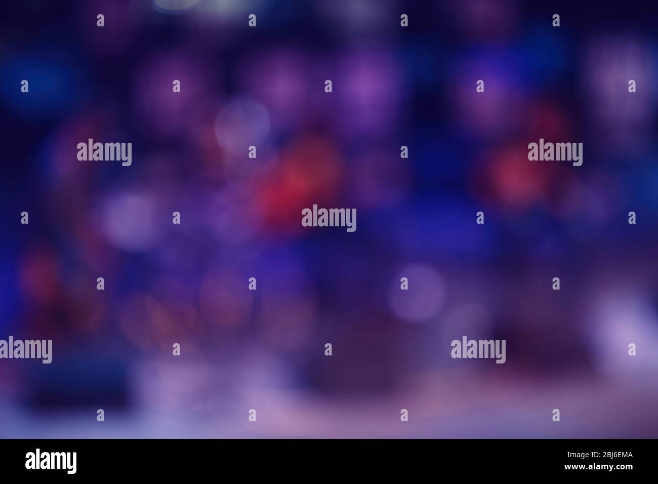 Blurred photo of a group playing musical instruments on a stage Stock ...