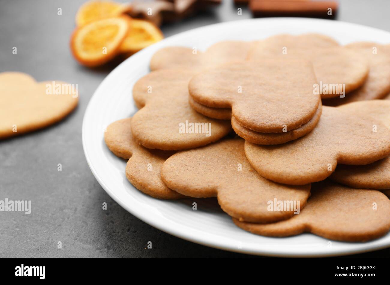 Heart shaped biscuits on plate, closeup Stock Photo - Alamy