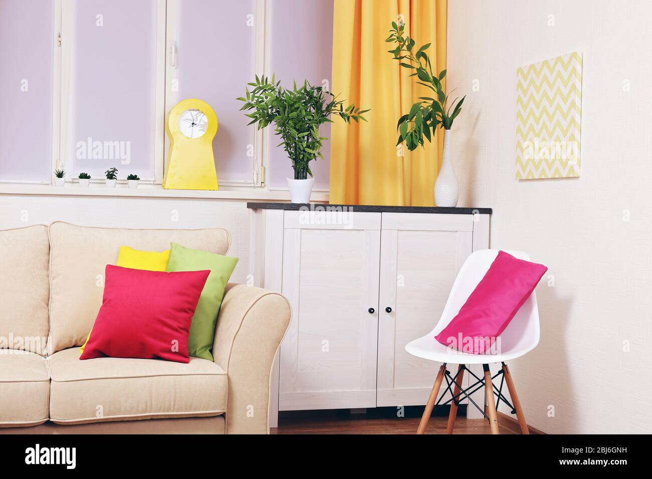 Modern interior design. Living room with sofa and wardrobe Stock Photo ...