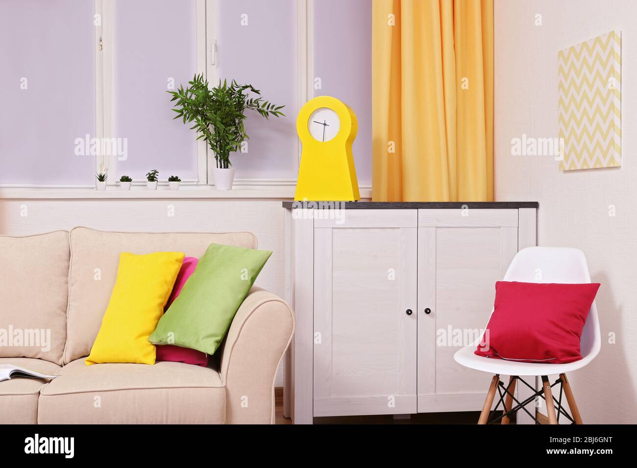 Modern interior design. Living room with sofa and wardrobe Stock Photo ...