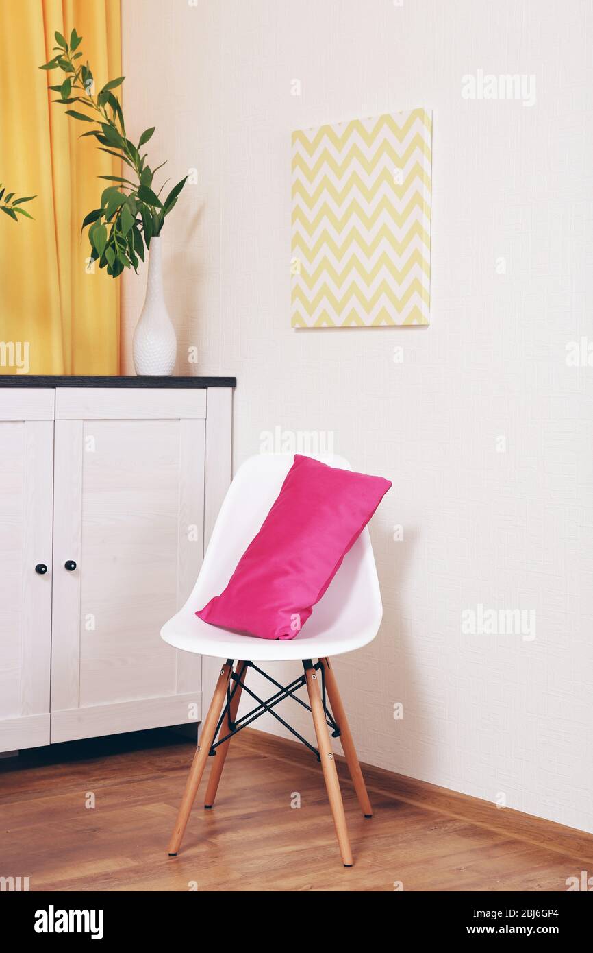 Modern interior design. Living room with chair and wardrobe Stock Photo ...