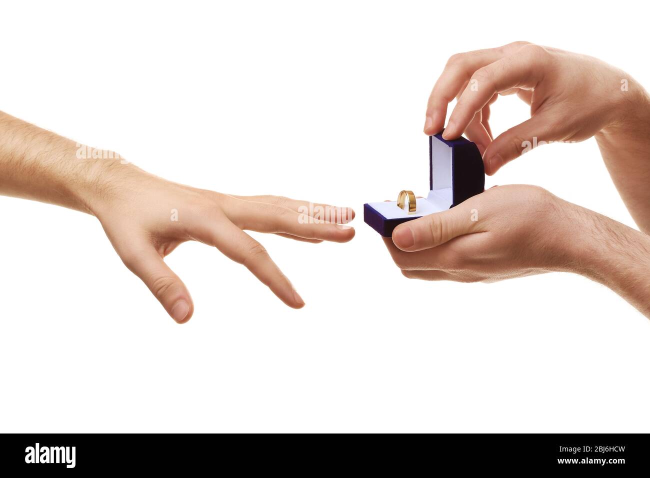 One groom giving wedding ring to another man isolated on white Stock ...