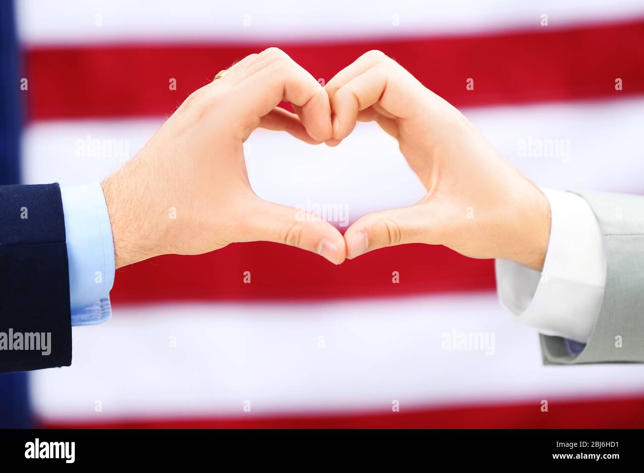 Hands touching american flag hi-res stock photography and images - Alamy