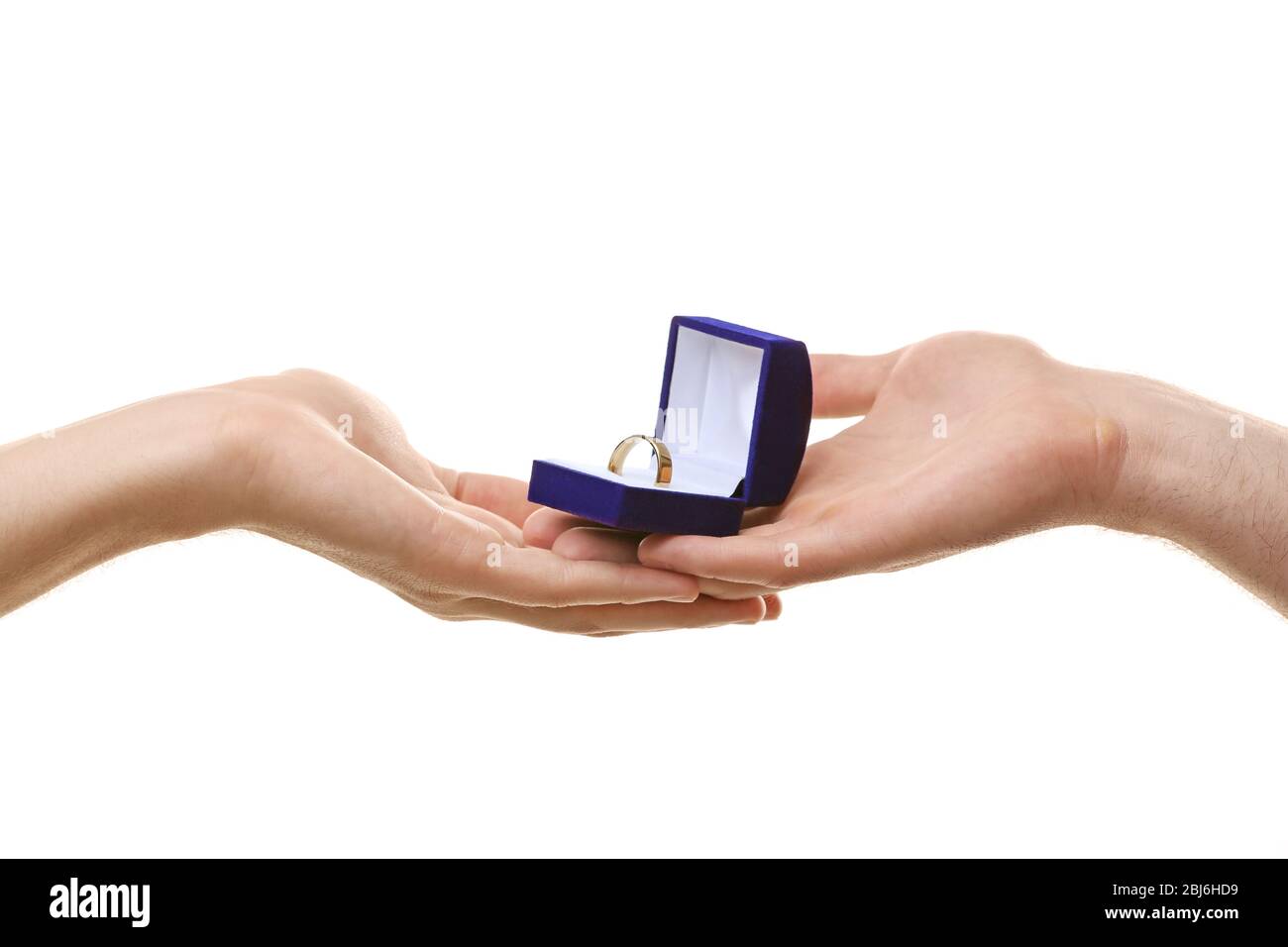 One groom giving wedding ring to another man isolated on white Stock ...