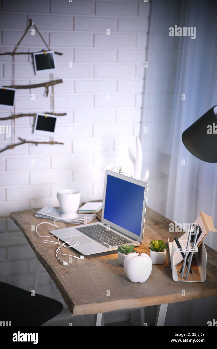 Modern workplace on light background Stock Photo - Alamy