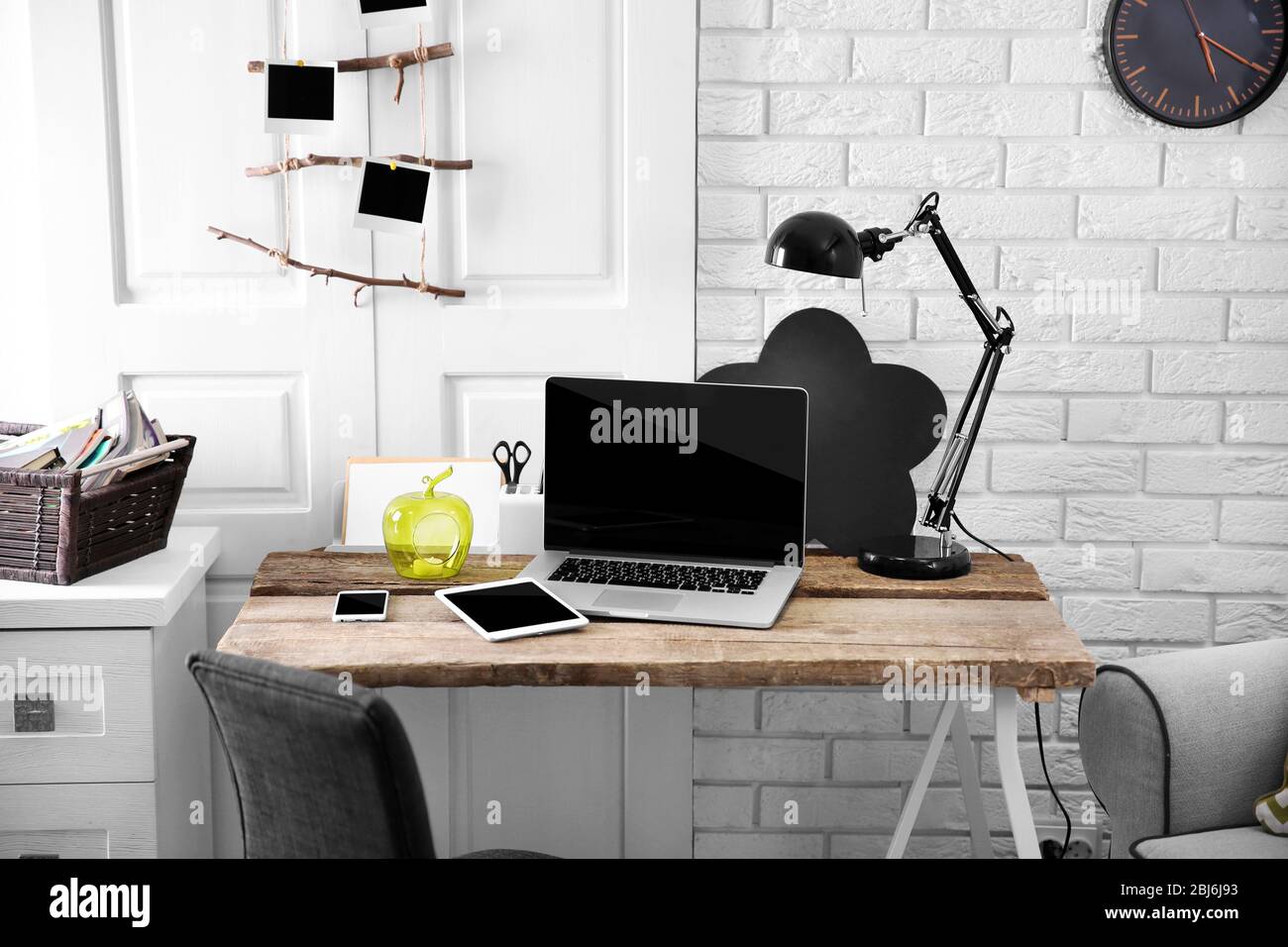 Modern workplace on light background Stock Photo - Alamy