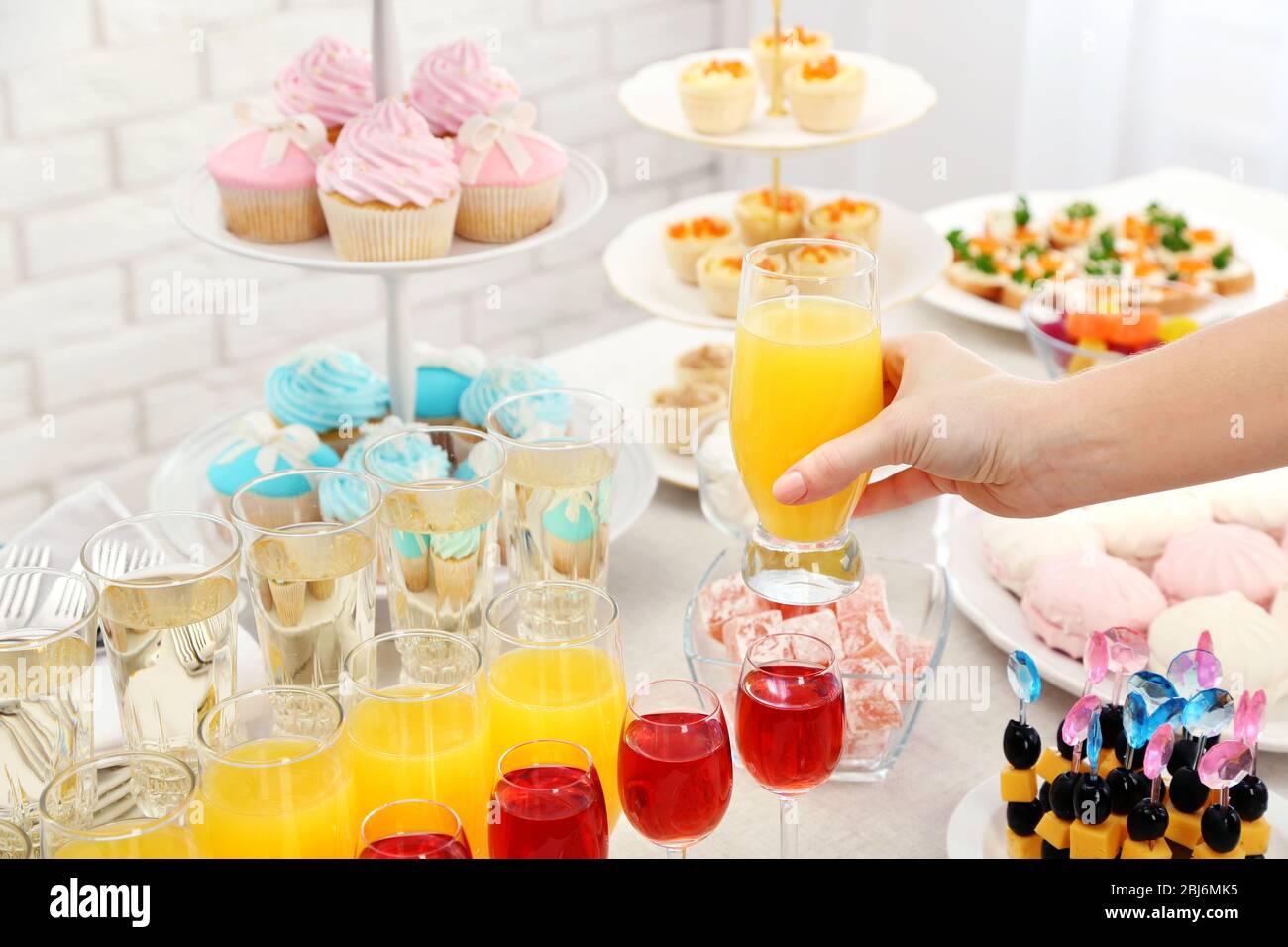 Woman cold buffet hi-res stock photography and images - Alamy