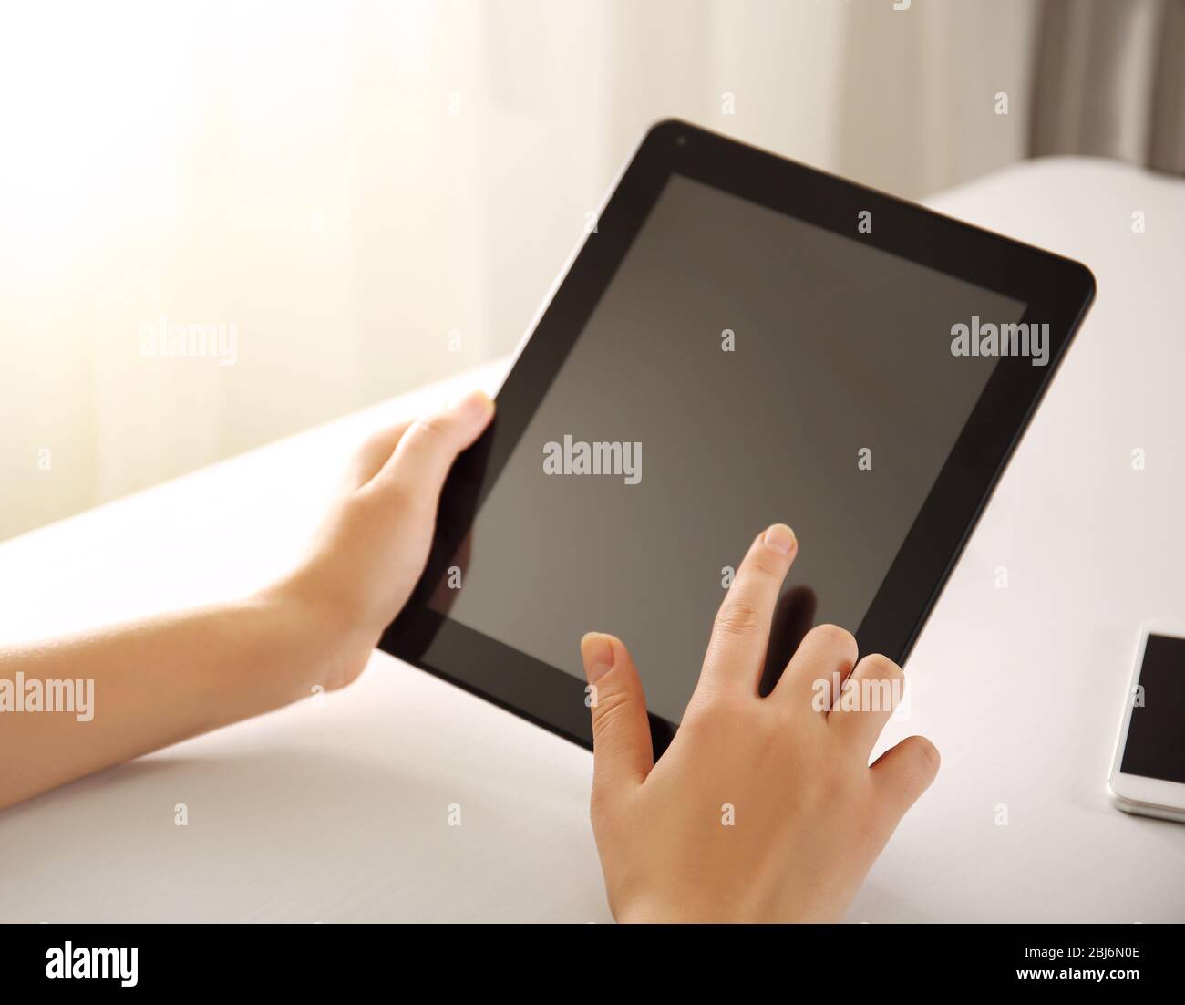 Female hands using modern hi-res stock photography and images - Alamy