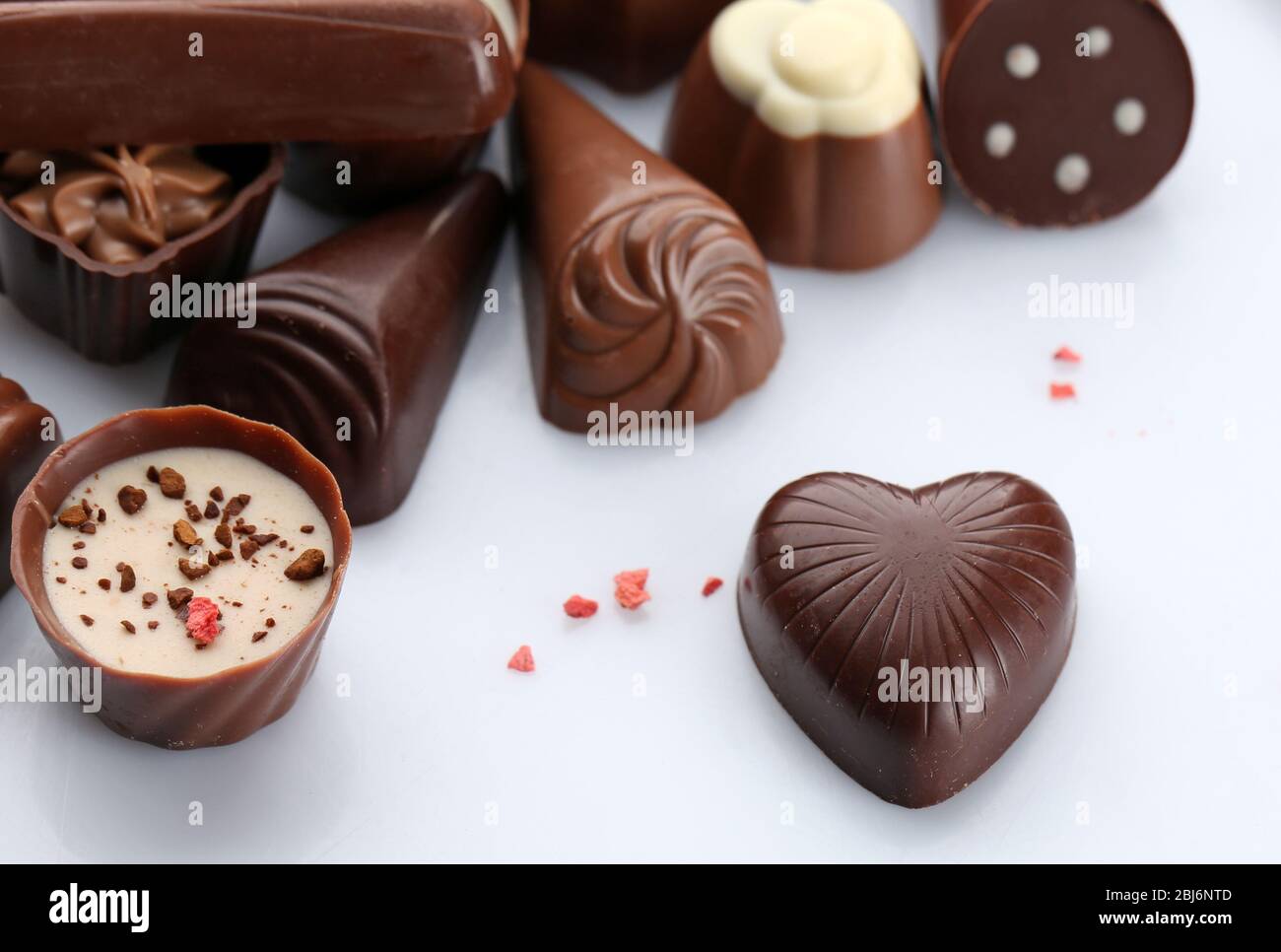 Assorted chocolate candies, isolated on white Stock Photo - Alamy