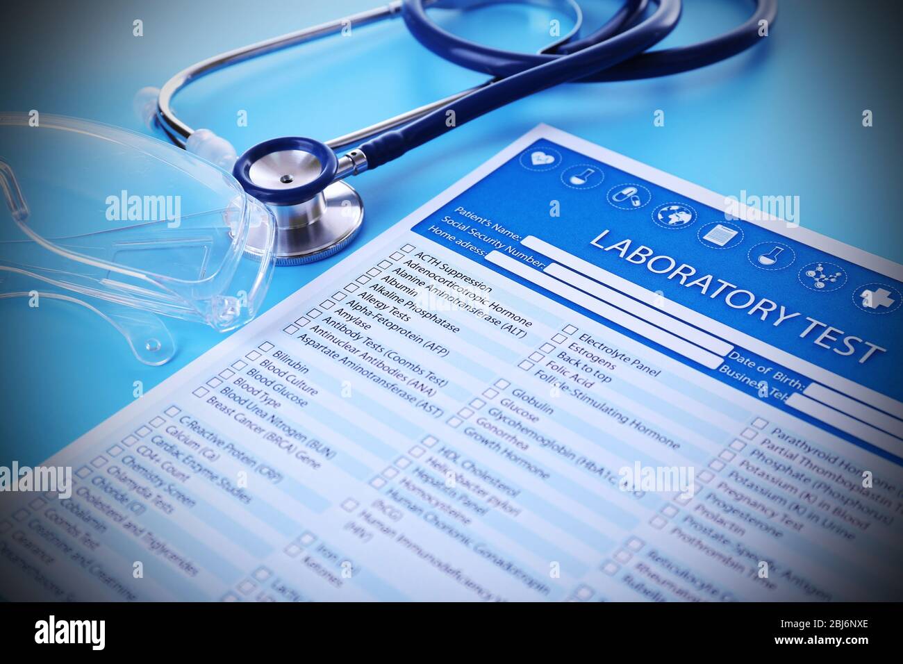 Laboratory test list, stethoscope and eyeglasses on blue background ...