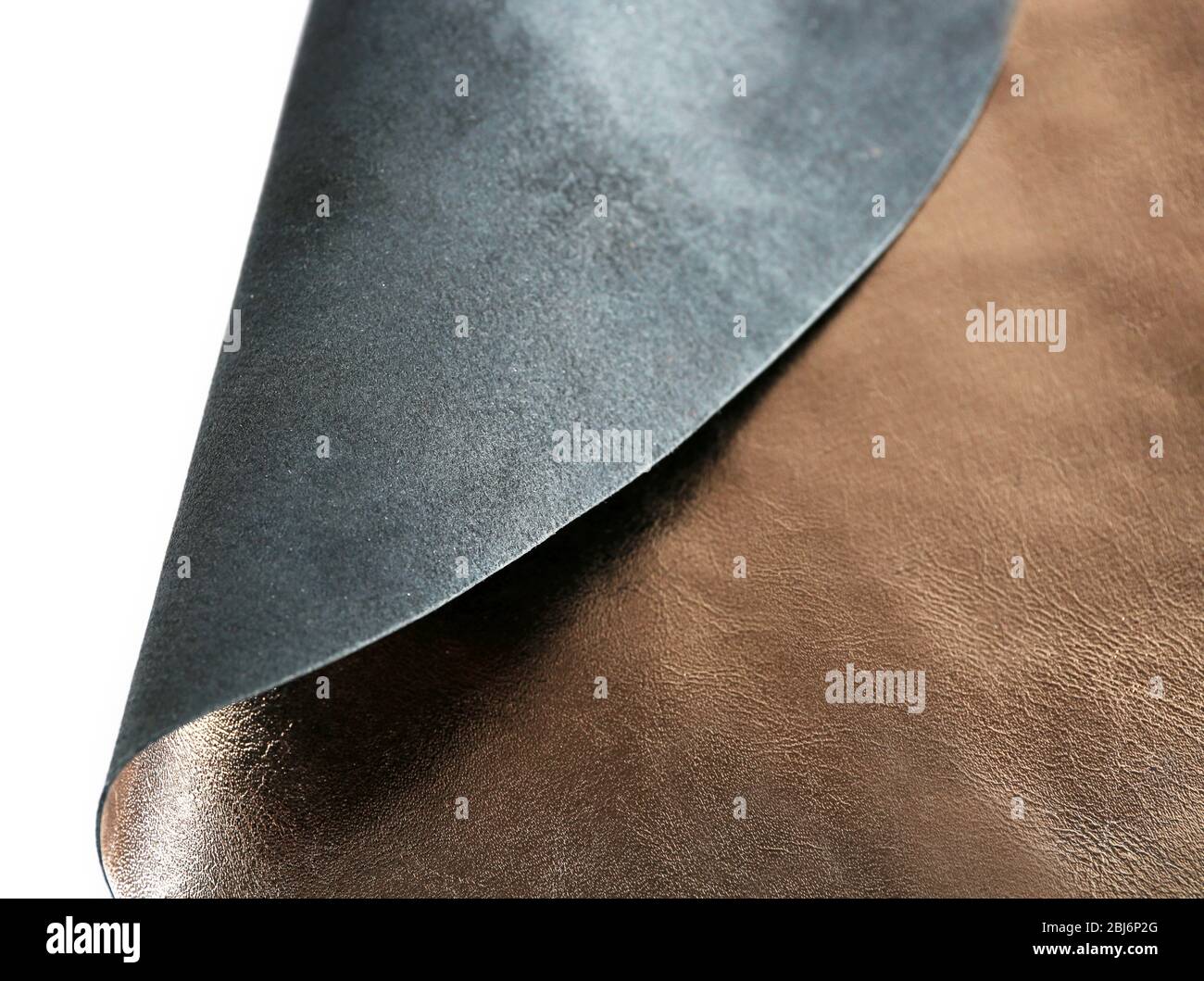 Dark brown shiny leather texture on white background, close up Stock ...