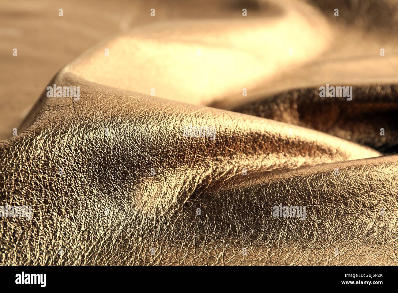Dark brown shiny leather texture close up Stock Photo - Alamy