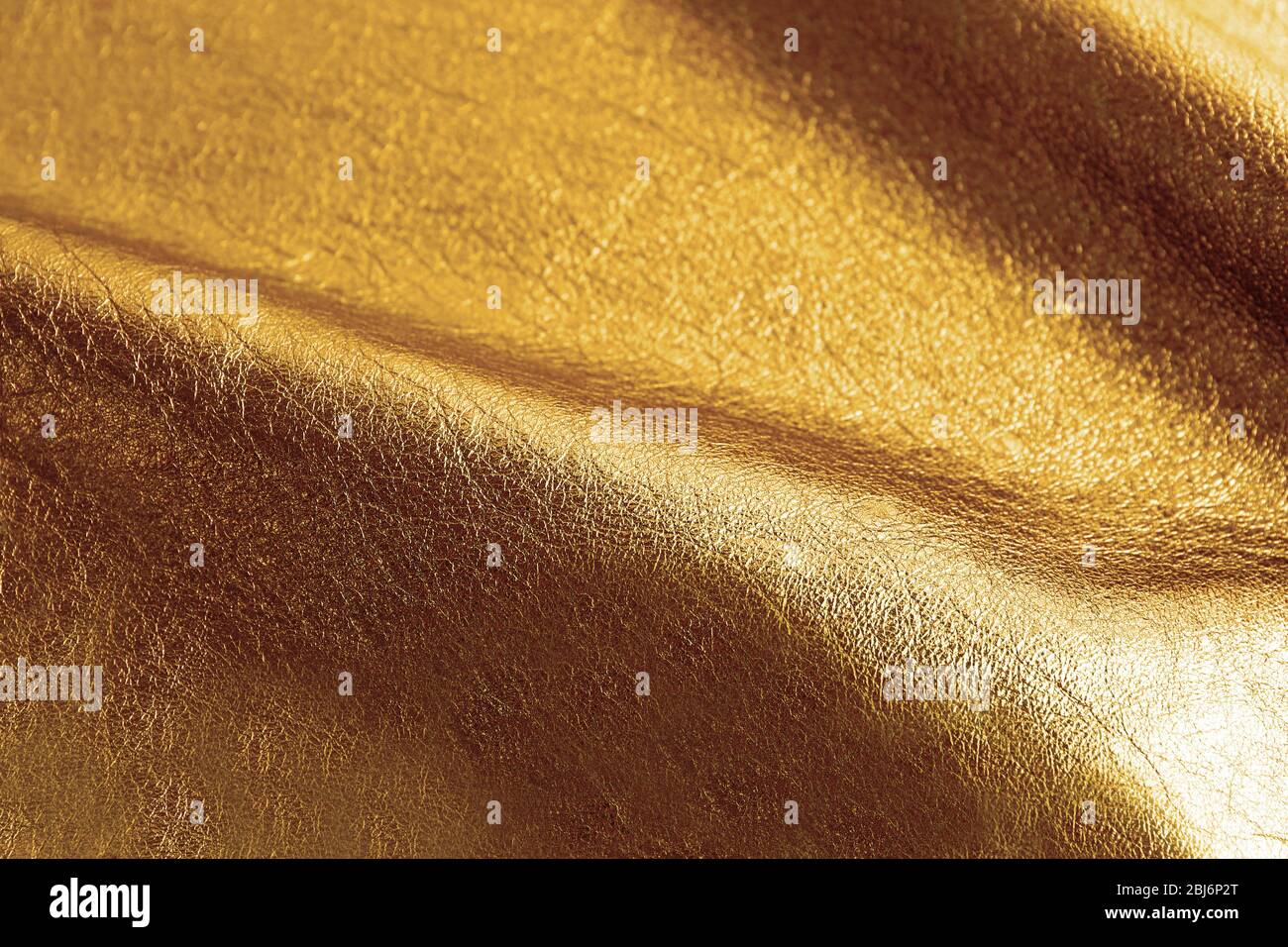 Dark brown shiny leather texture close up Stock Photo - Alamy