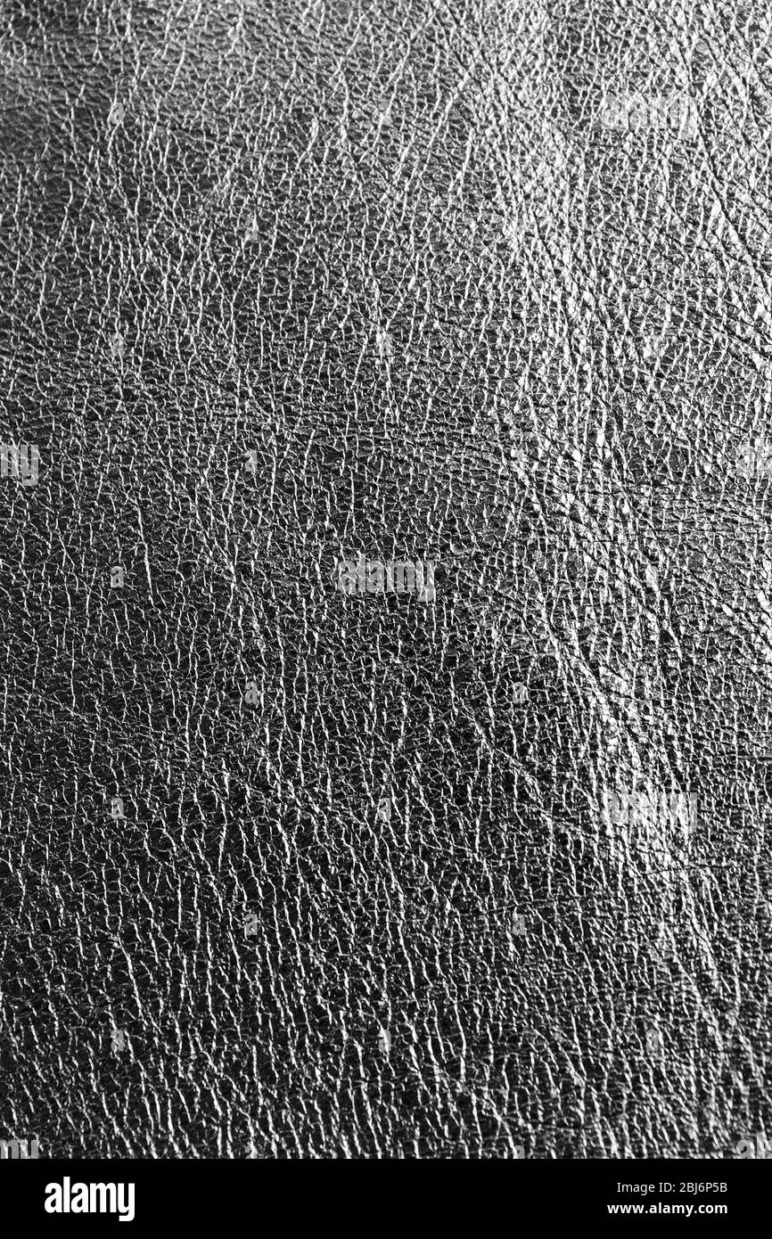 Dark brown shiny leather texture close up Stock Photo - Alamy