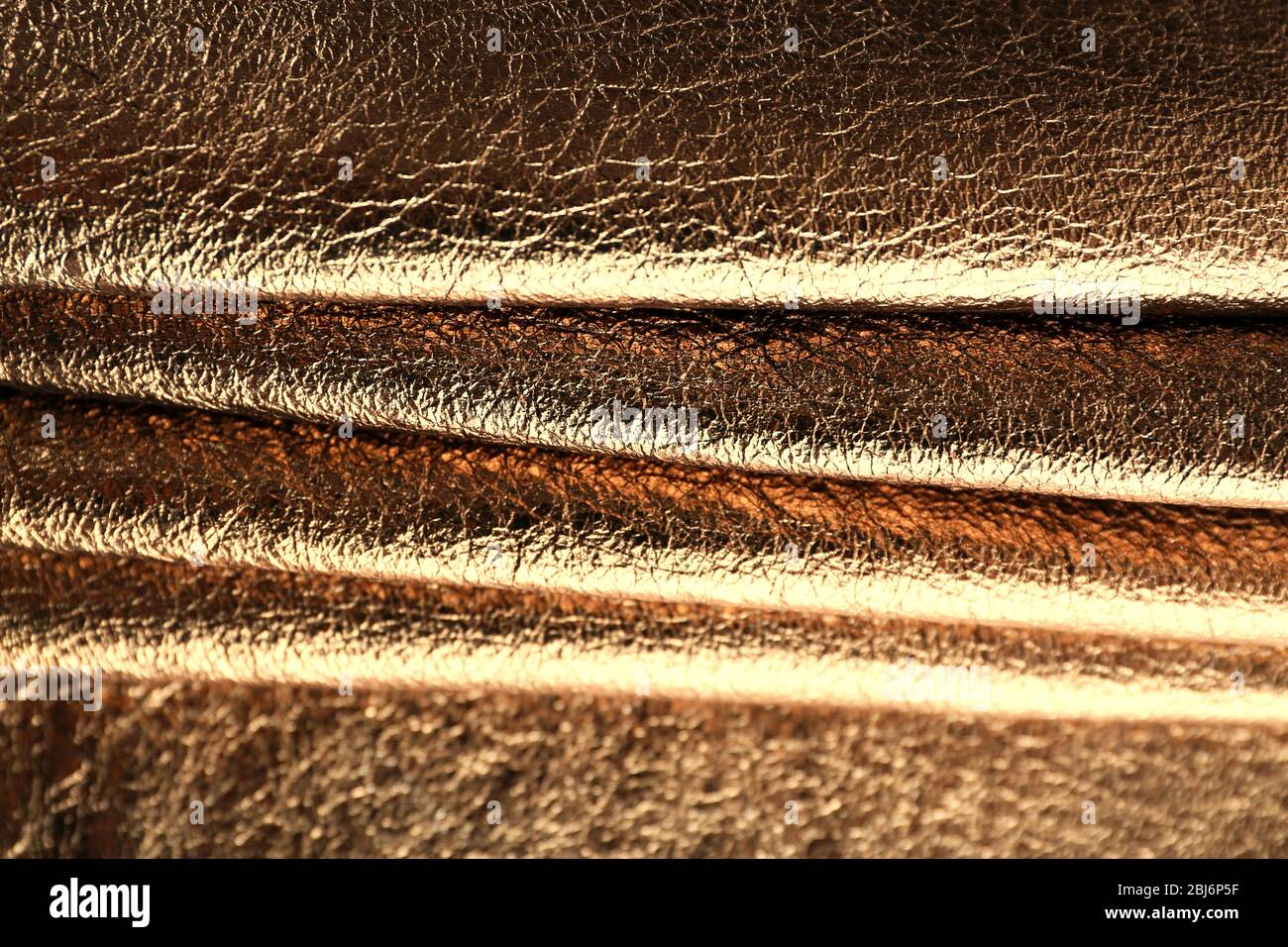 Dark brown shiny leather texture close up Stock Photo - Alamy