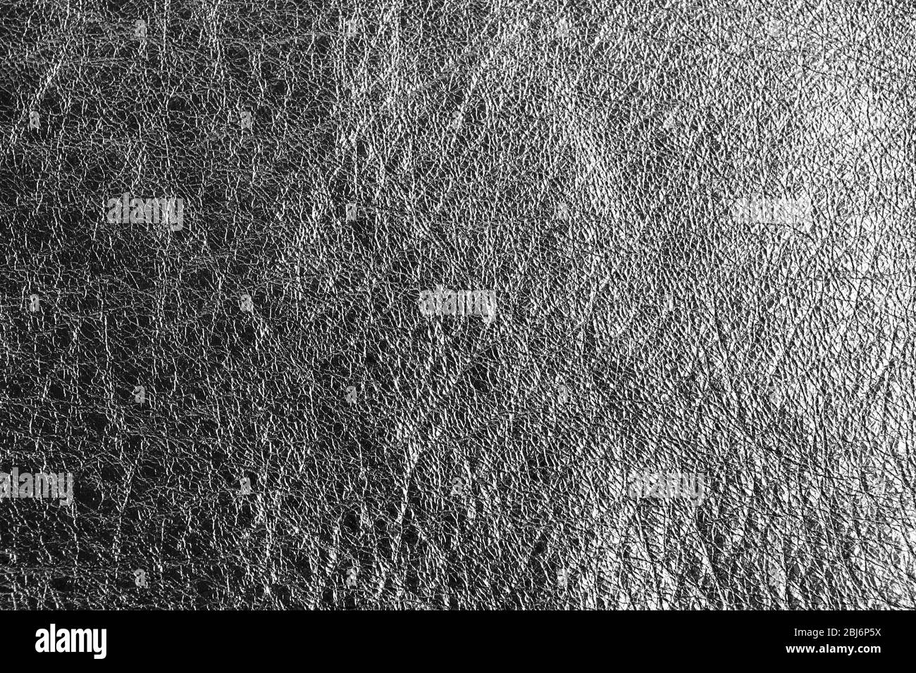Dark brown shiny leather texture close up Stock Photo - Alamy