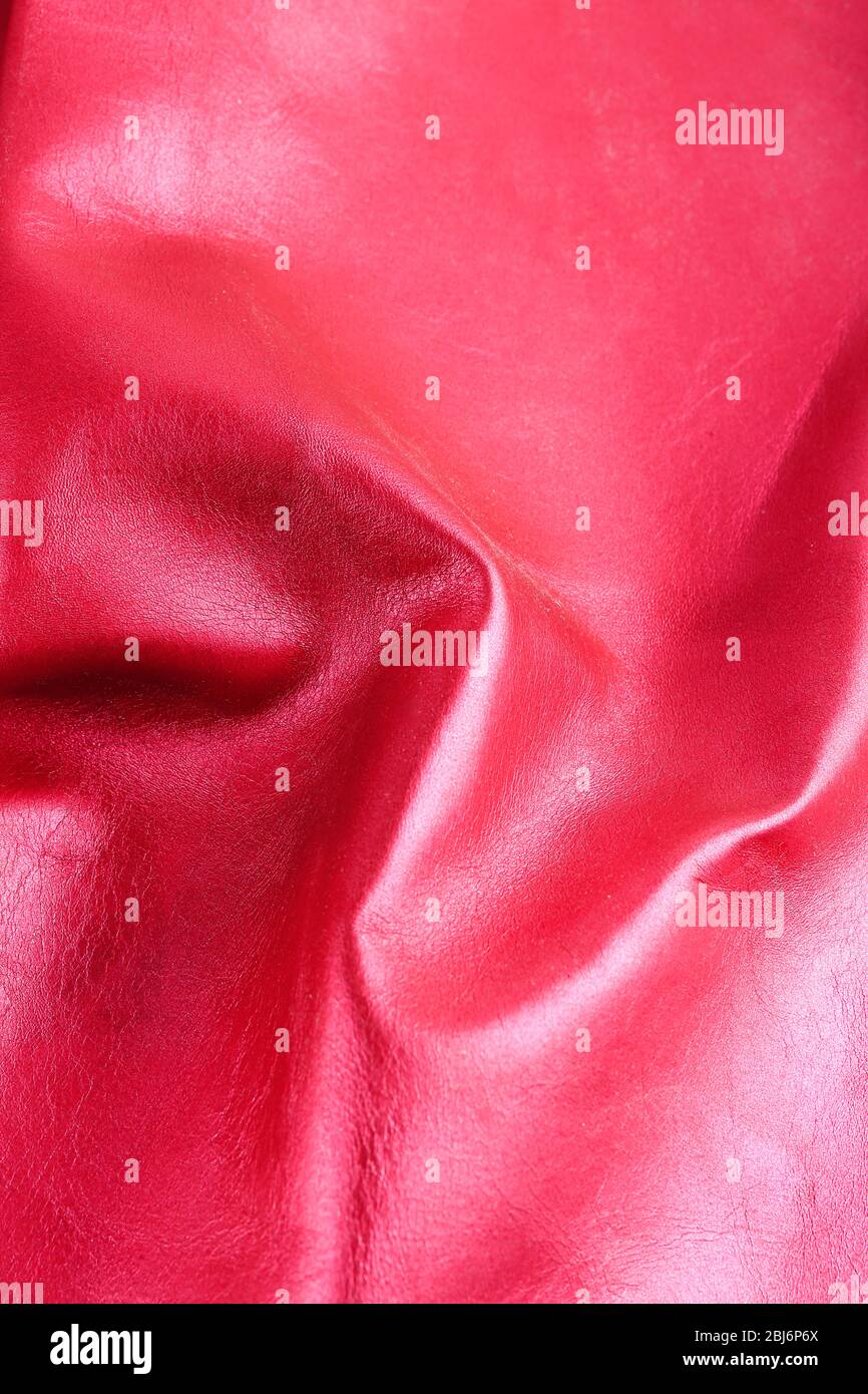 Red shiny leather texture close up Stock Photo - Alamy