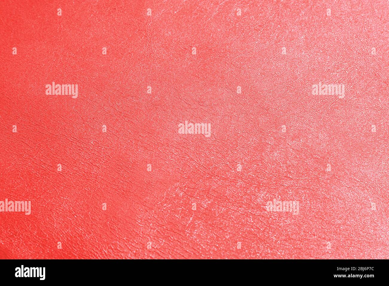 Red shiny leather texture close up Stock Photo - Alamy