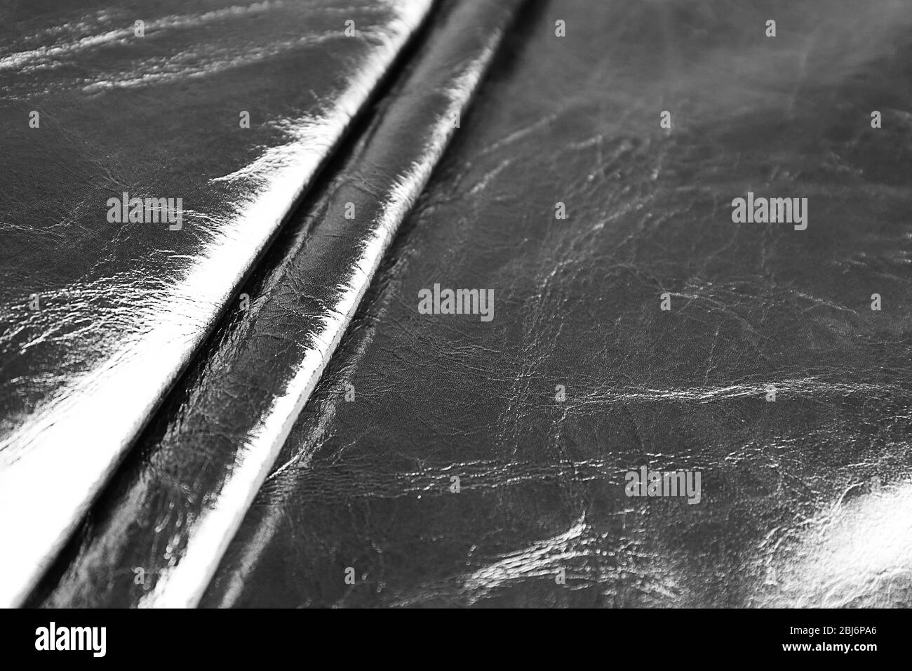 Black shiny leather texture hi-res stock photography and images - Alamy