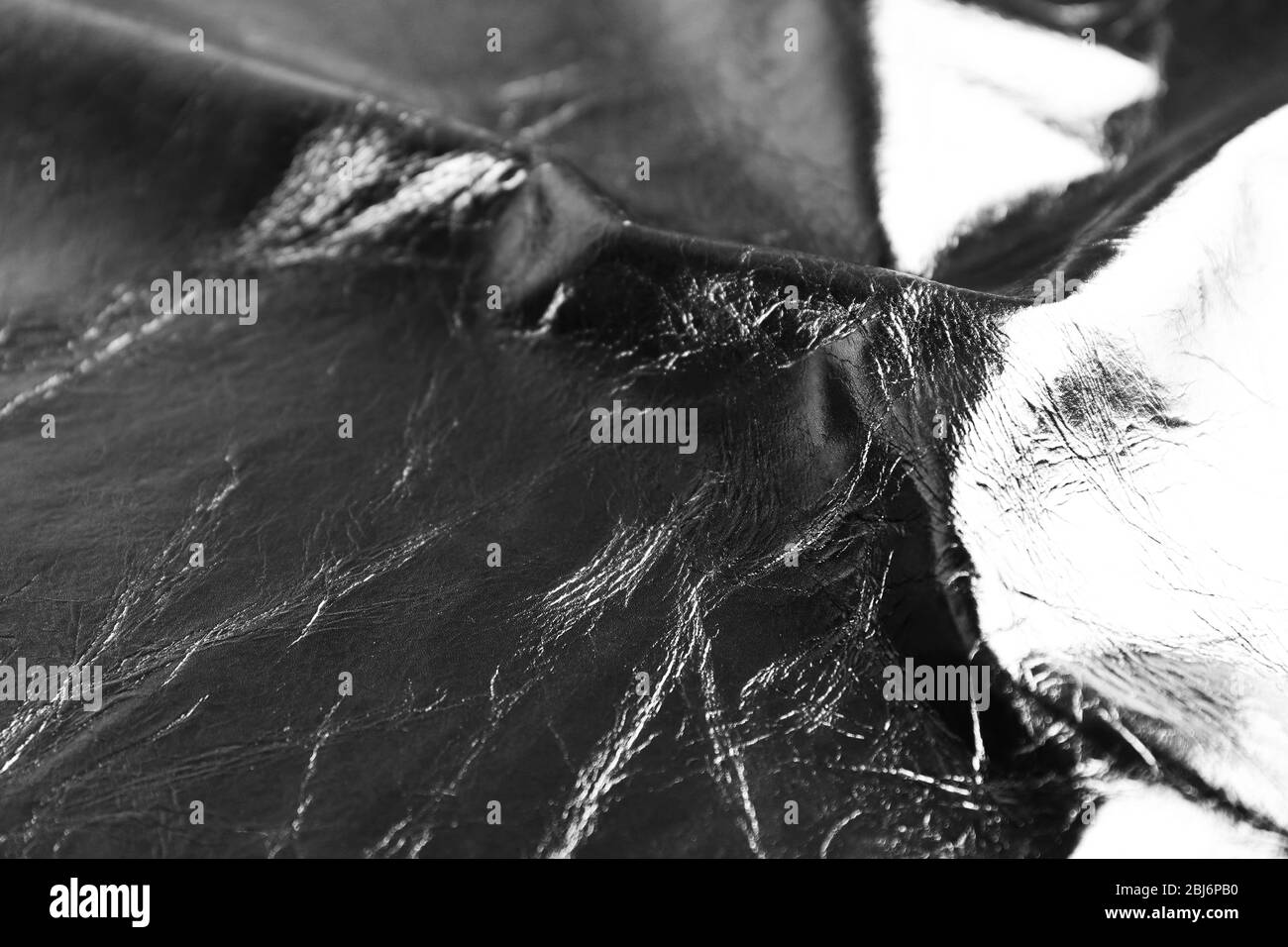 Black shiny leather texture hi-res stock photography and images - Alamy