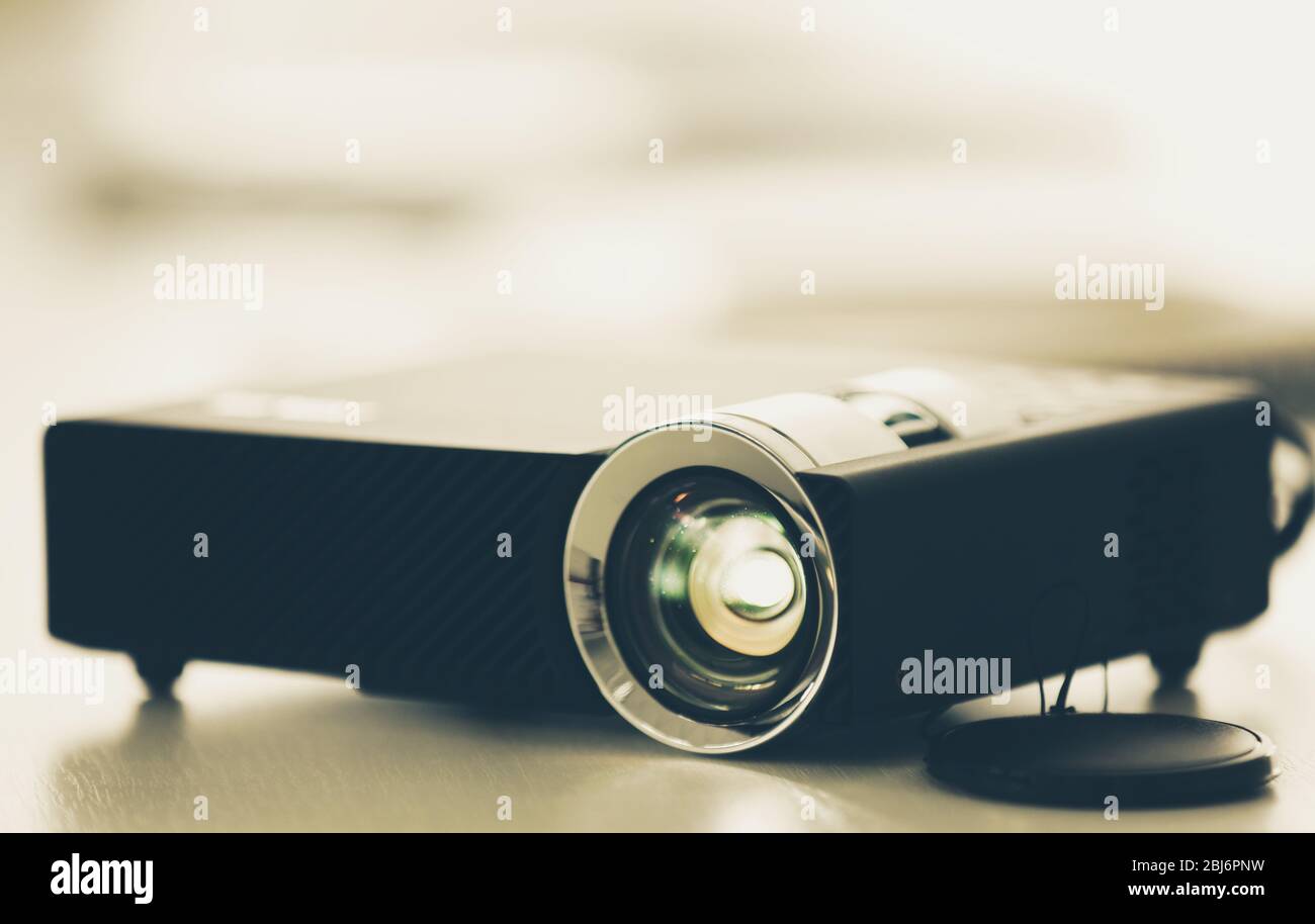 Black projector on light table, close up Stock Photo - Alamy