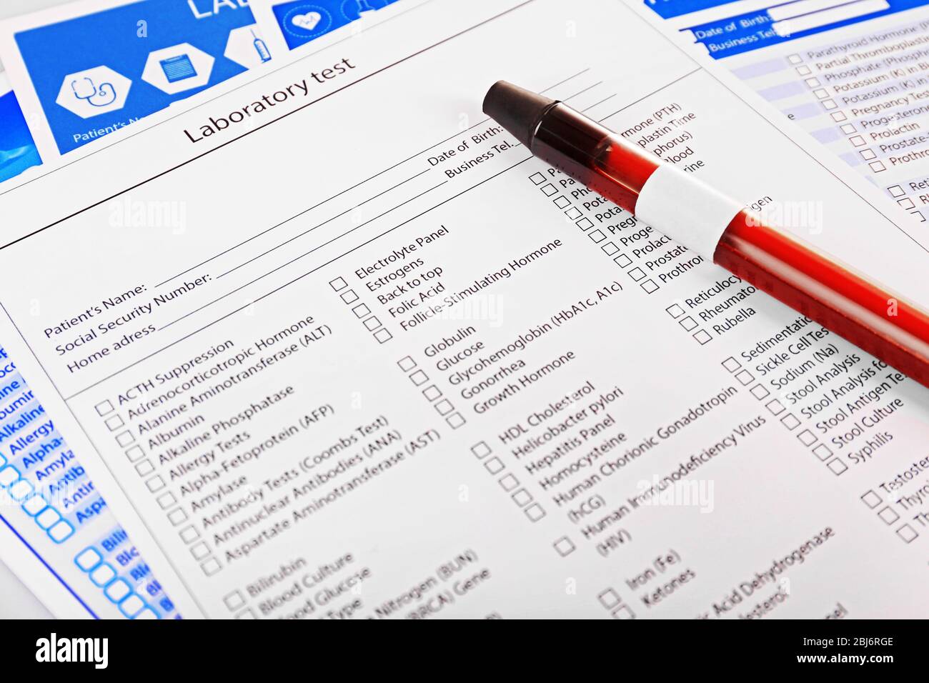 Blood in test tubes and investigation form on the table, close-up Stock ...
