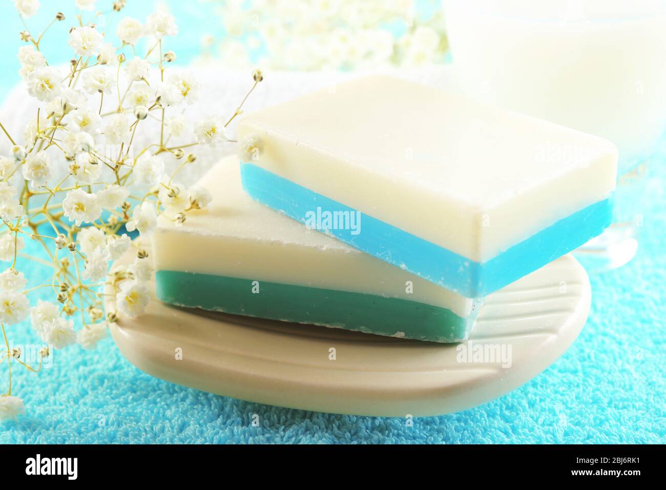 Soap set on a towel background, close up Stock Photo - Alamy
