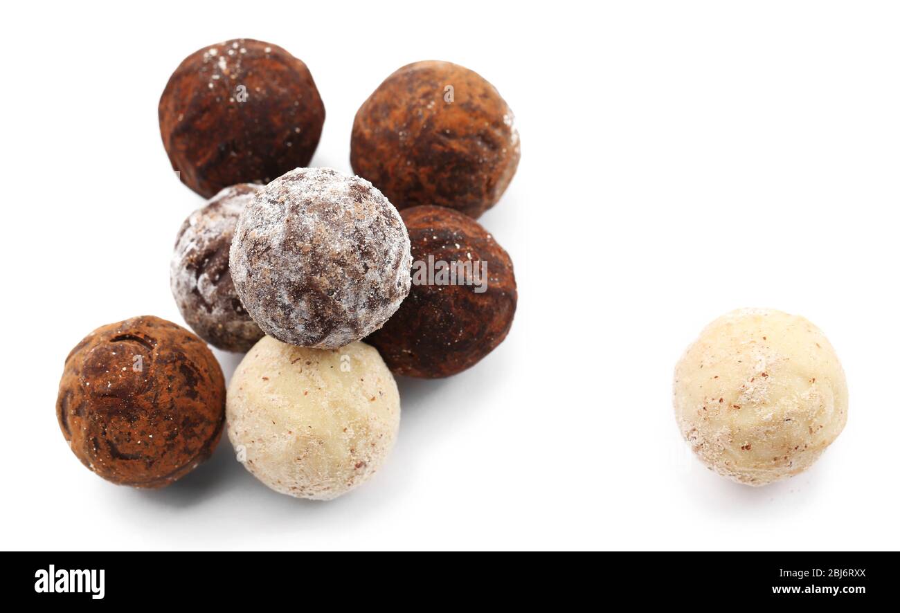 Group of chocolate truffles, isolated on white Stock Photo - Alamy