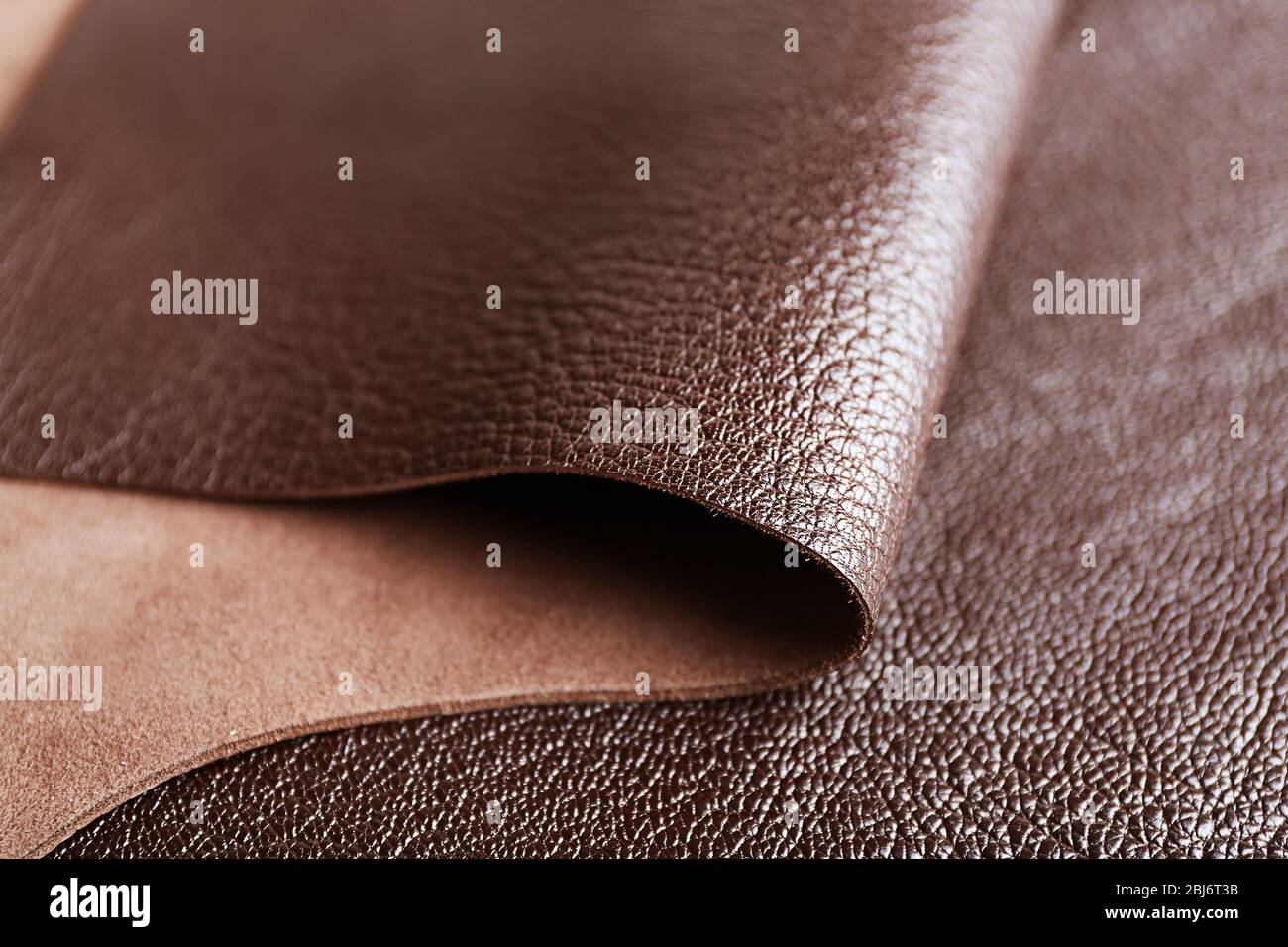 Brown leather front and wrong side texture background Stock Photo - Alamy