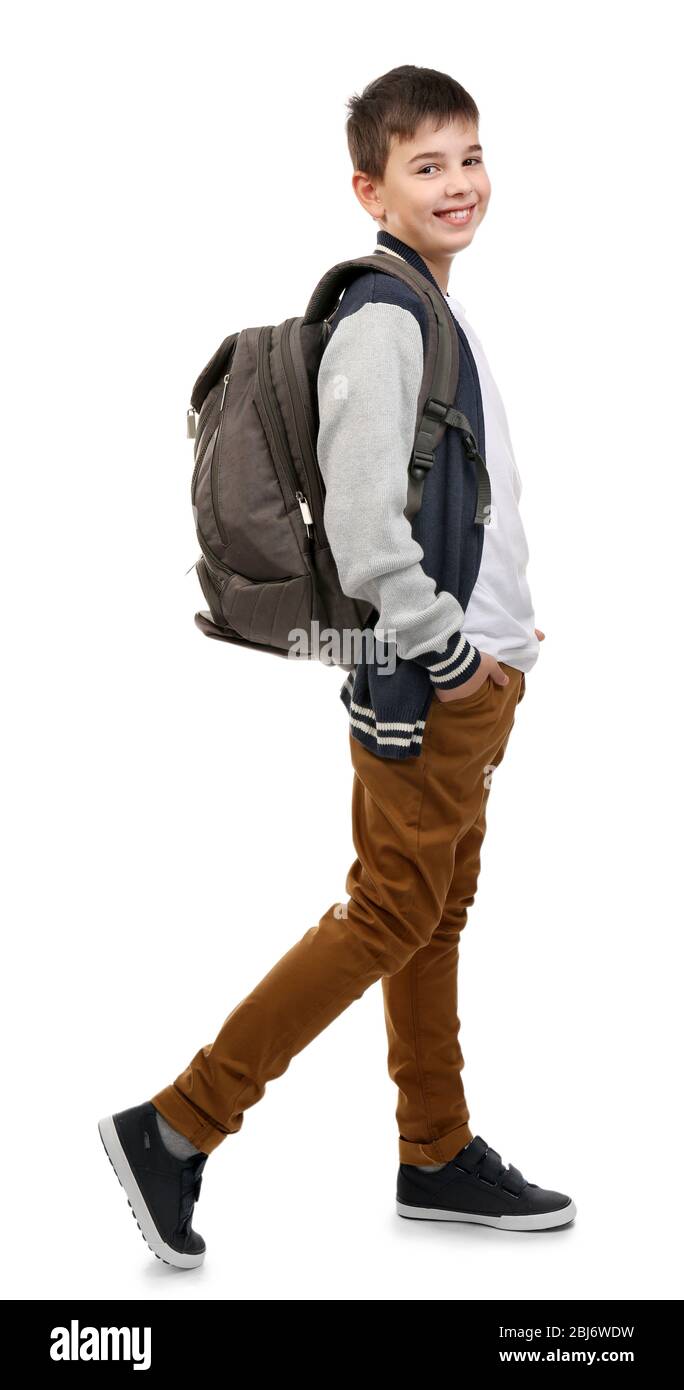 Cute little boy with grey backpack going right, isolated on white Stock ...