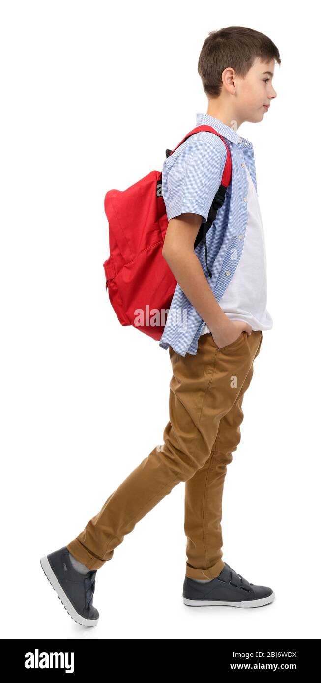 Cute little boy with red backpack going right, isolated on white Stock ...