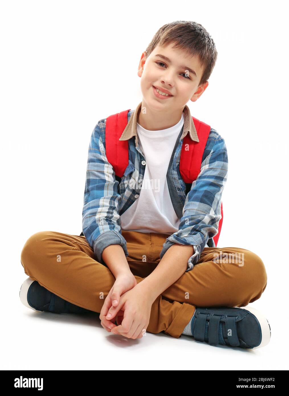Cute little boy with red backpack, isolated on white Stock Photo - Alamy