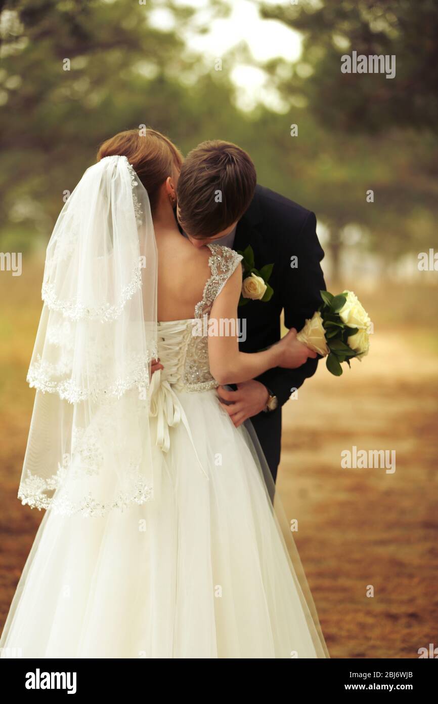 Bride kissing flower girl hi-res stock photography and images - Alamy
