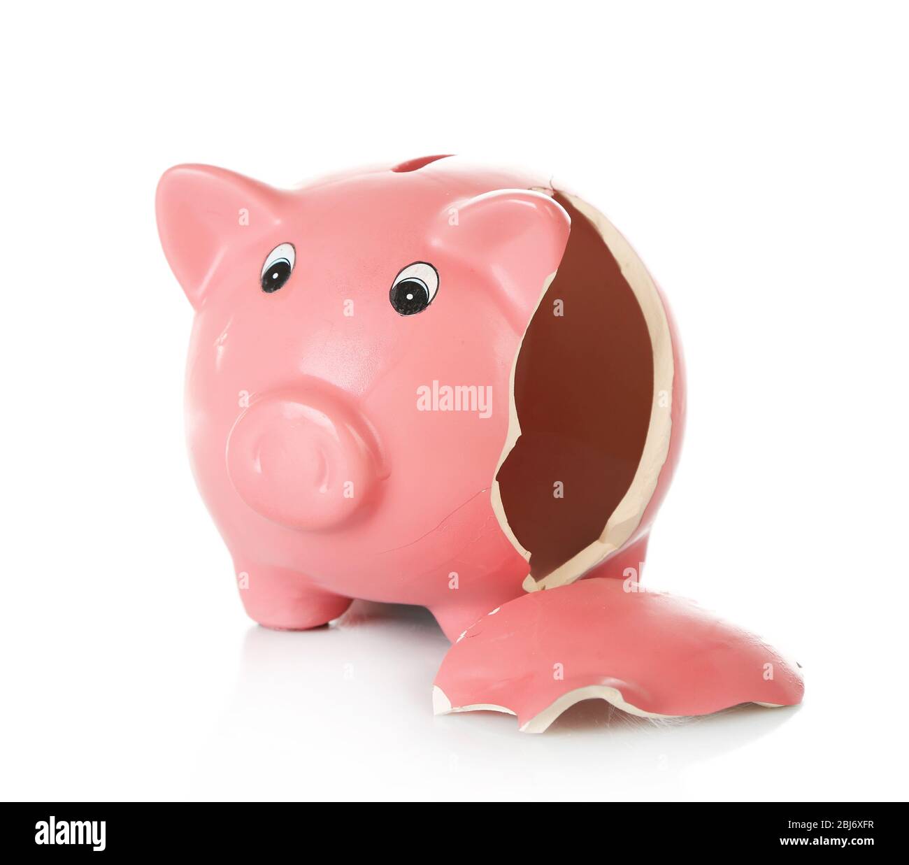 Broken piggy bank isolated on white background Stock Photo - Alamy