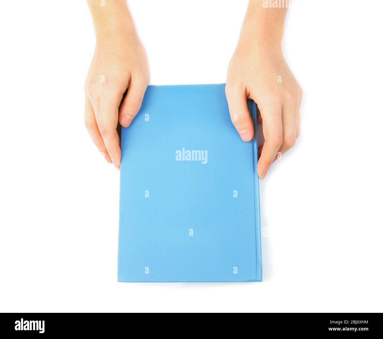 Female hands holding book, isolated on white Stock Photo - Alamy