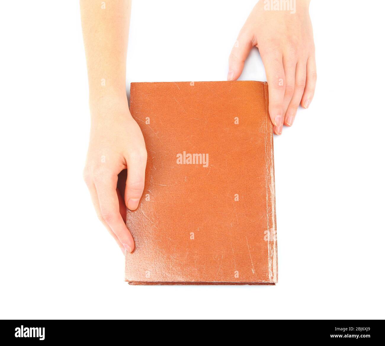 Female hands holding book, isolated on white Stock Photo - Alamy