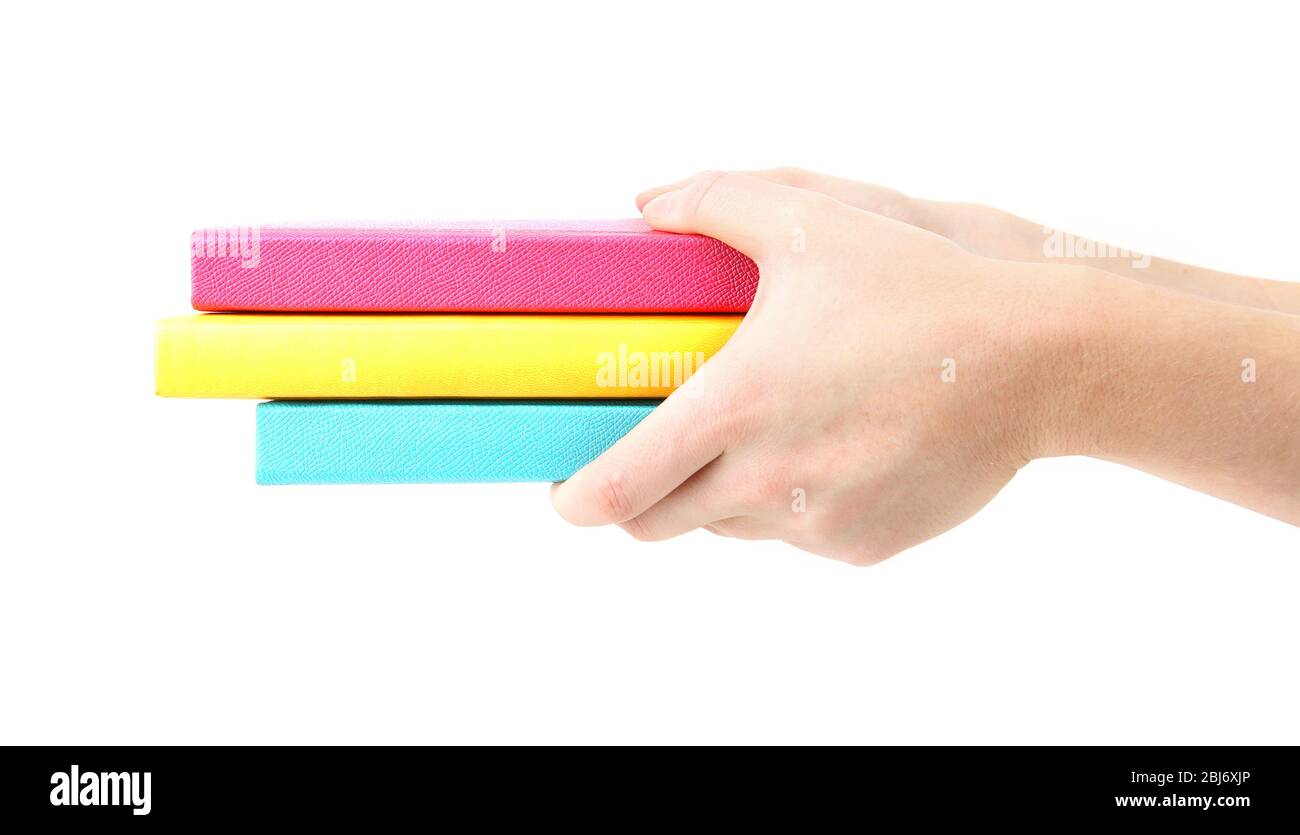 Hand holding books hi-res stock photography and images - Alamy