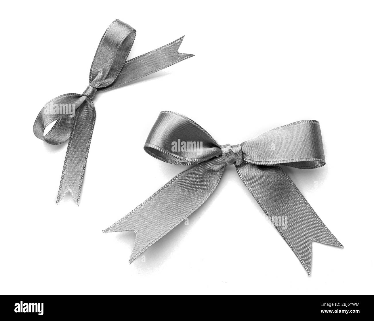 Beautiful silver bows isolated on white background Stock Photo - Alamy