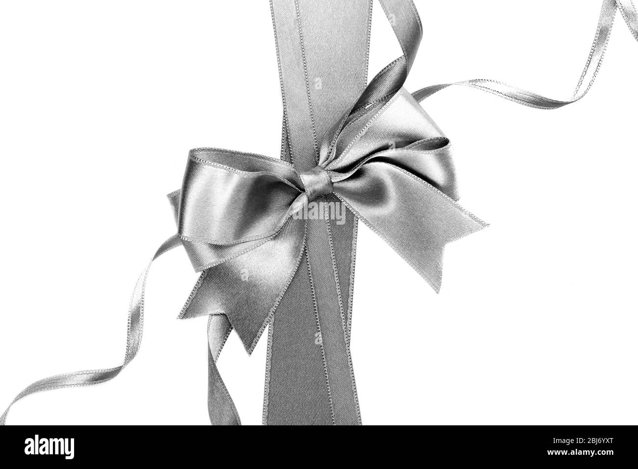 Silver silk ribbon with beautiful bow isolated on white background ...