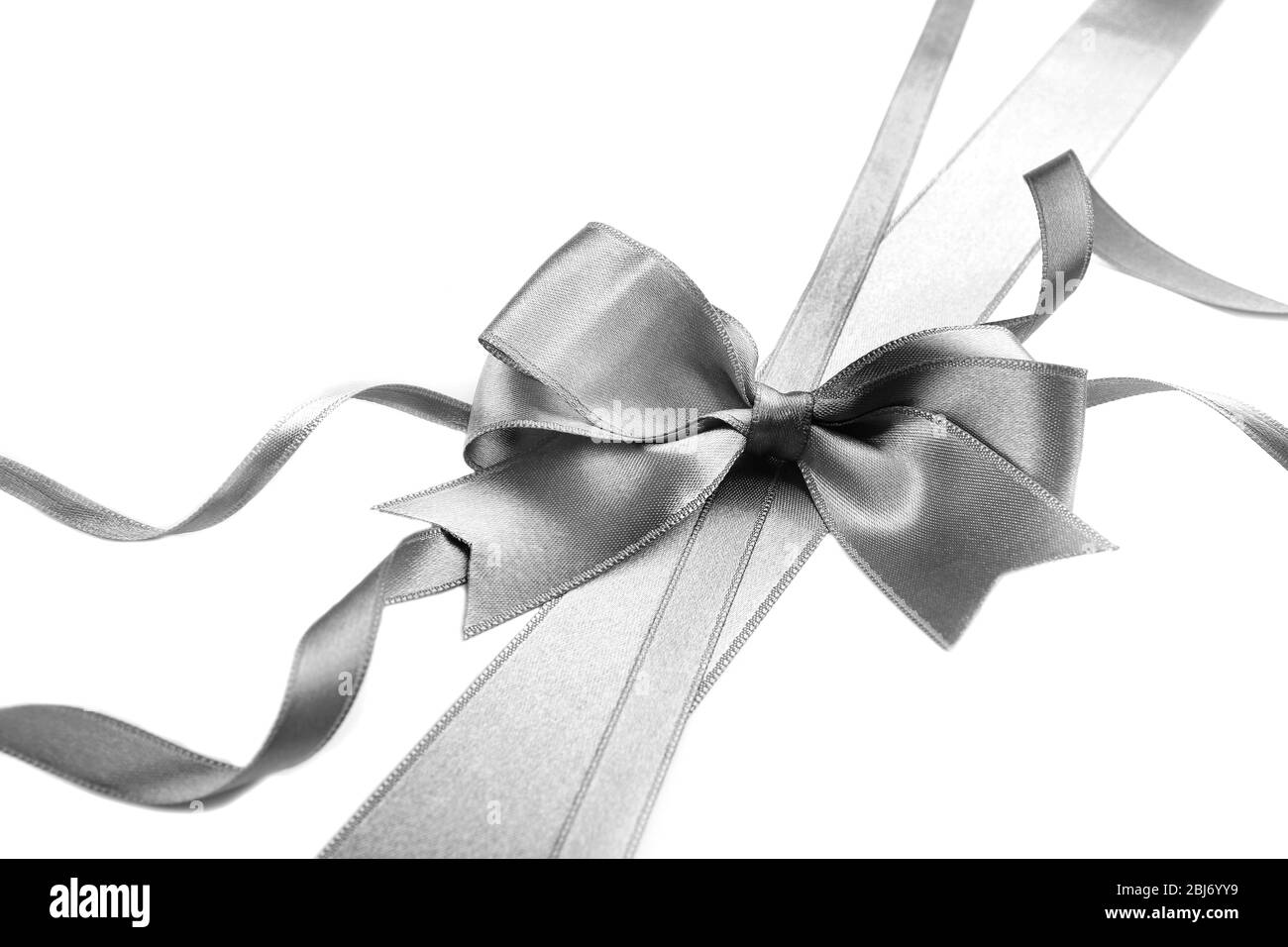 Silver silk ribbon with beautiful bow isolated on white background ...
