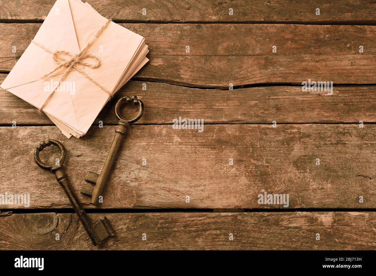 Old keys with papers, ink and pen on wooden background, close up Stock ...