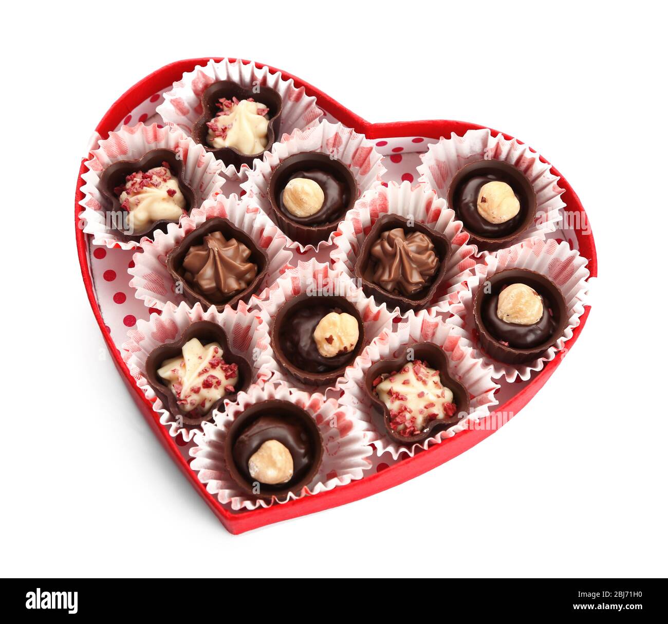 Heart shaped box with candies, isolated on white Stock Photo - Alamy