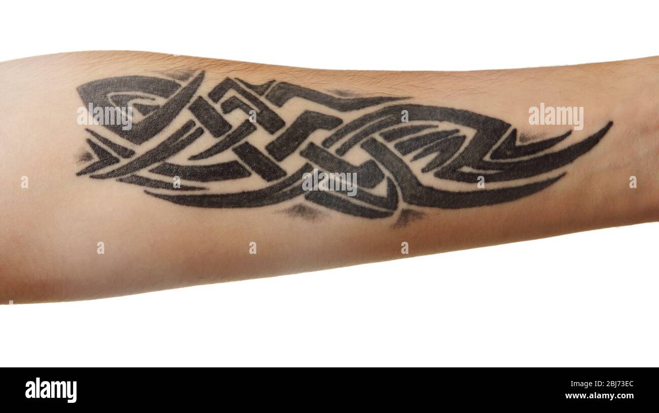 Abstract tattoo on male forearm over white background Stock Photo - Alamy
