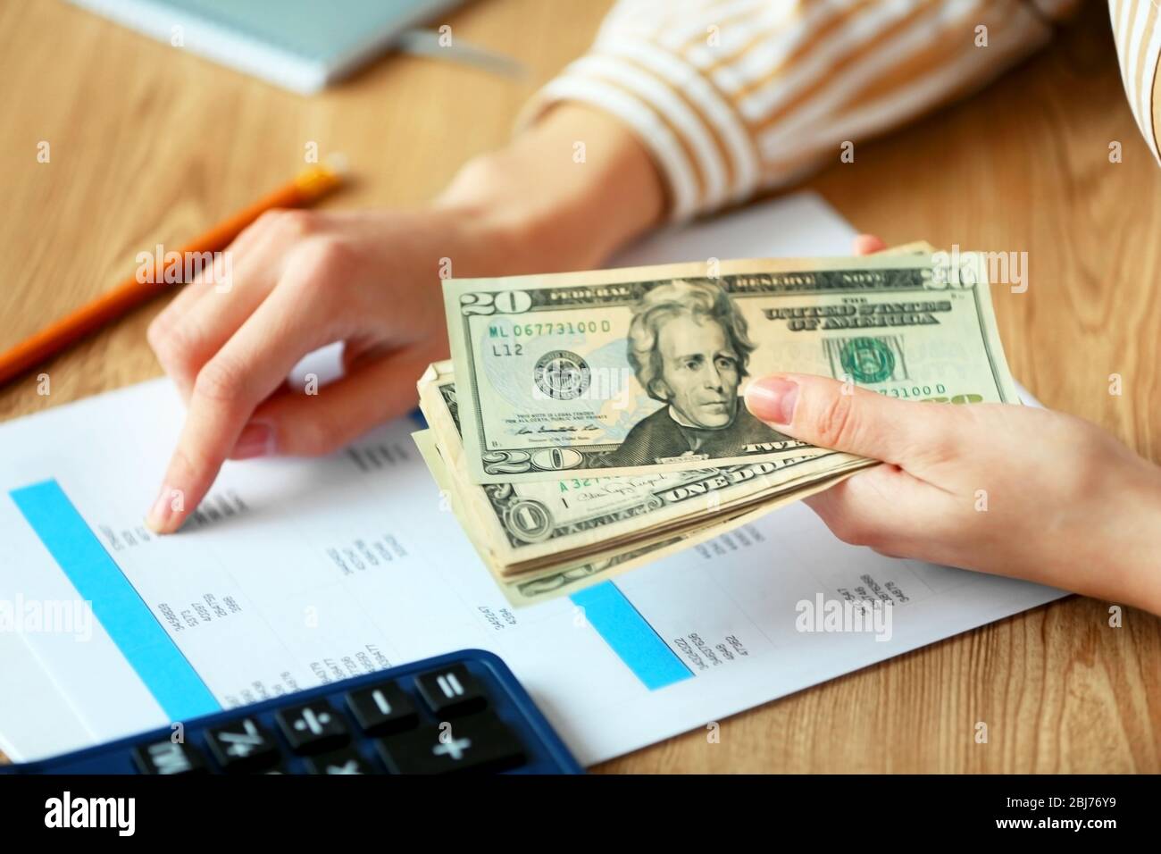 Counting debit hi-res stock photography and images - Alamy