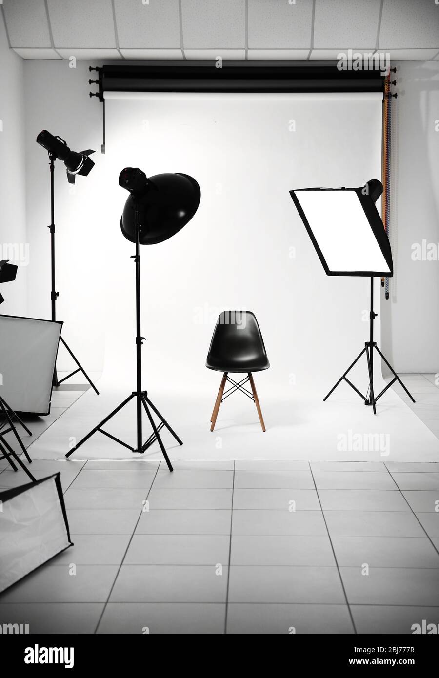 Empty photo studio with lighting equipment Stock Photo - Alamy
