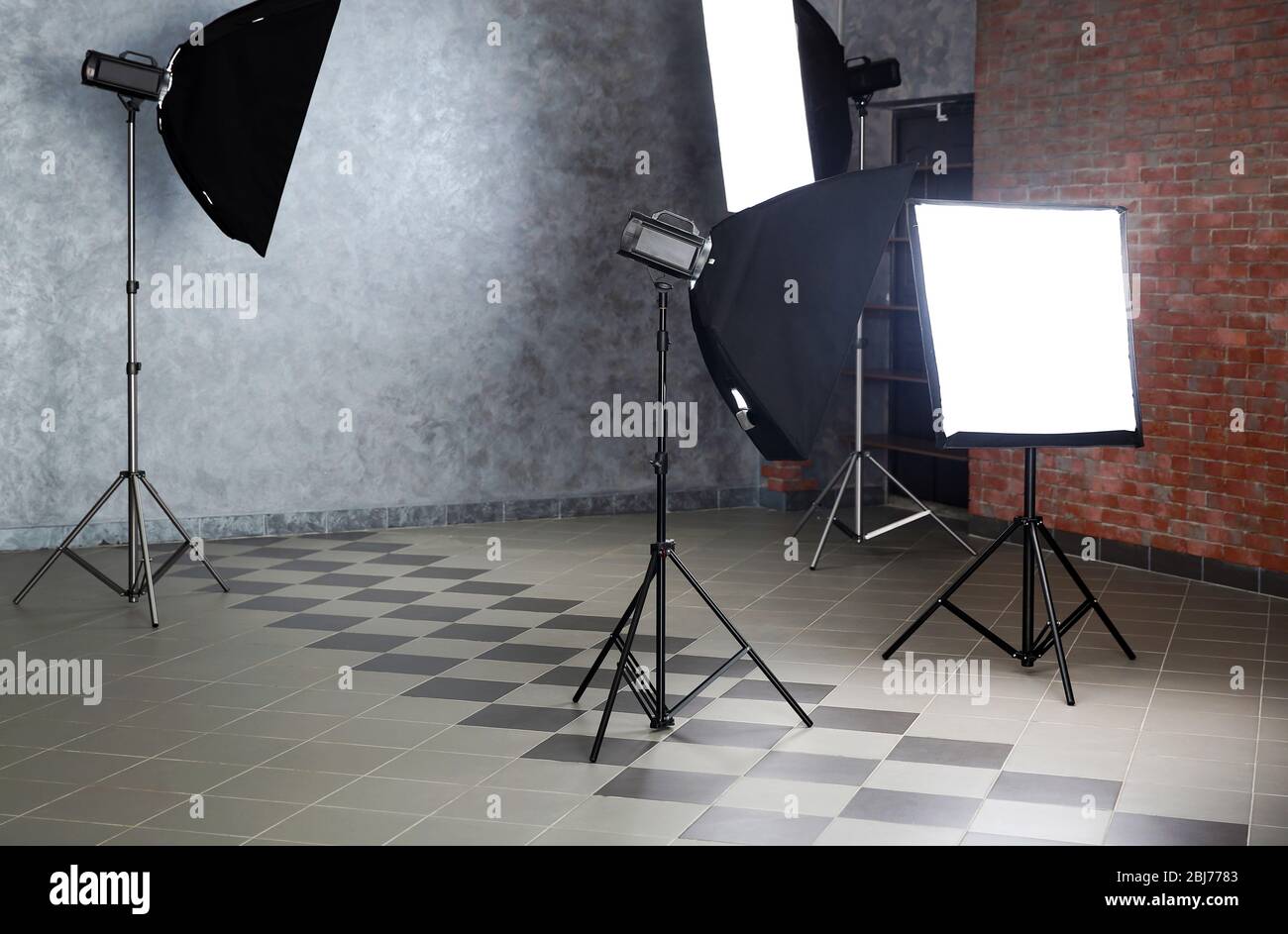 Empty photo studio with lighting equipment Stock Photo - Alamy