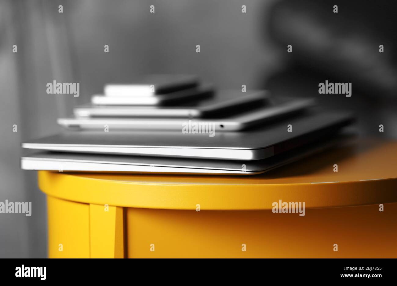 Pile of electronic gadgets on the table. Communication and technology ...