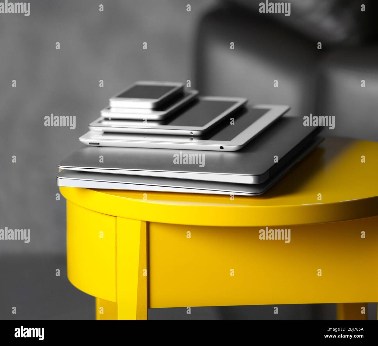 Pile of electronic gadgets on the table. Communication and technology ...